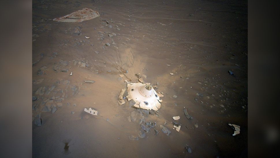 Mars helicopter photographs wreckage of its own landing gear in eerily ...