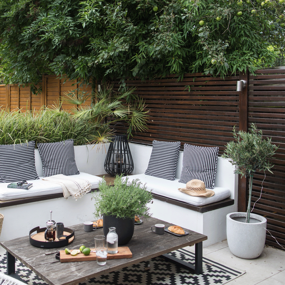 Structural planting, lighting and built-in furniture transform unloved ...