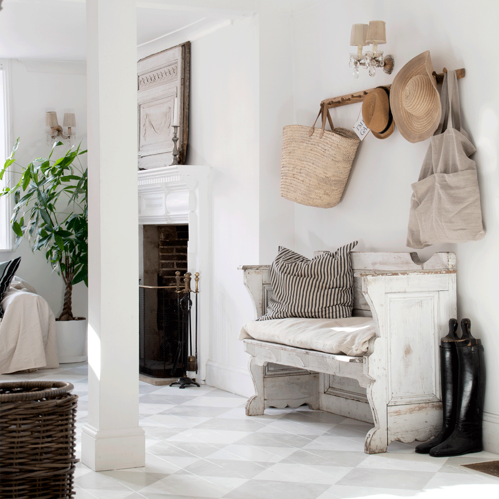 A quirky old rectory on numerous levels celebrates an all-white palette ...