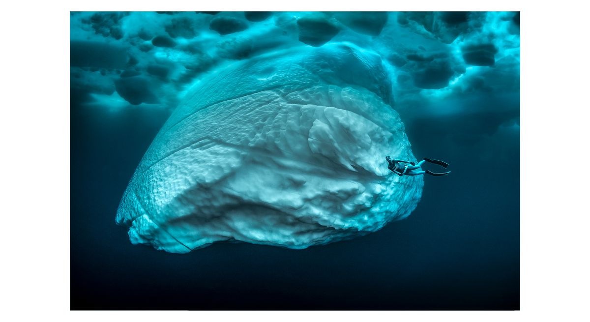 This photo won $200,000: picture of wind farm under a dramatic sky ...