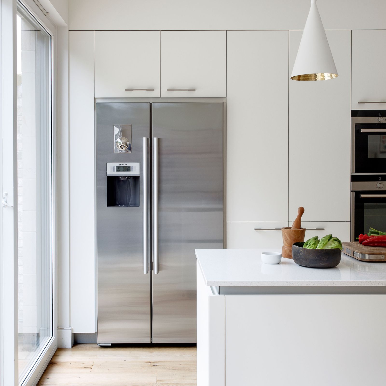 Where to position a fridge for prime access and a practical cooking ...