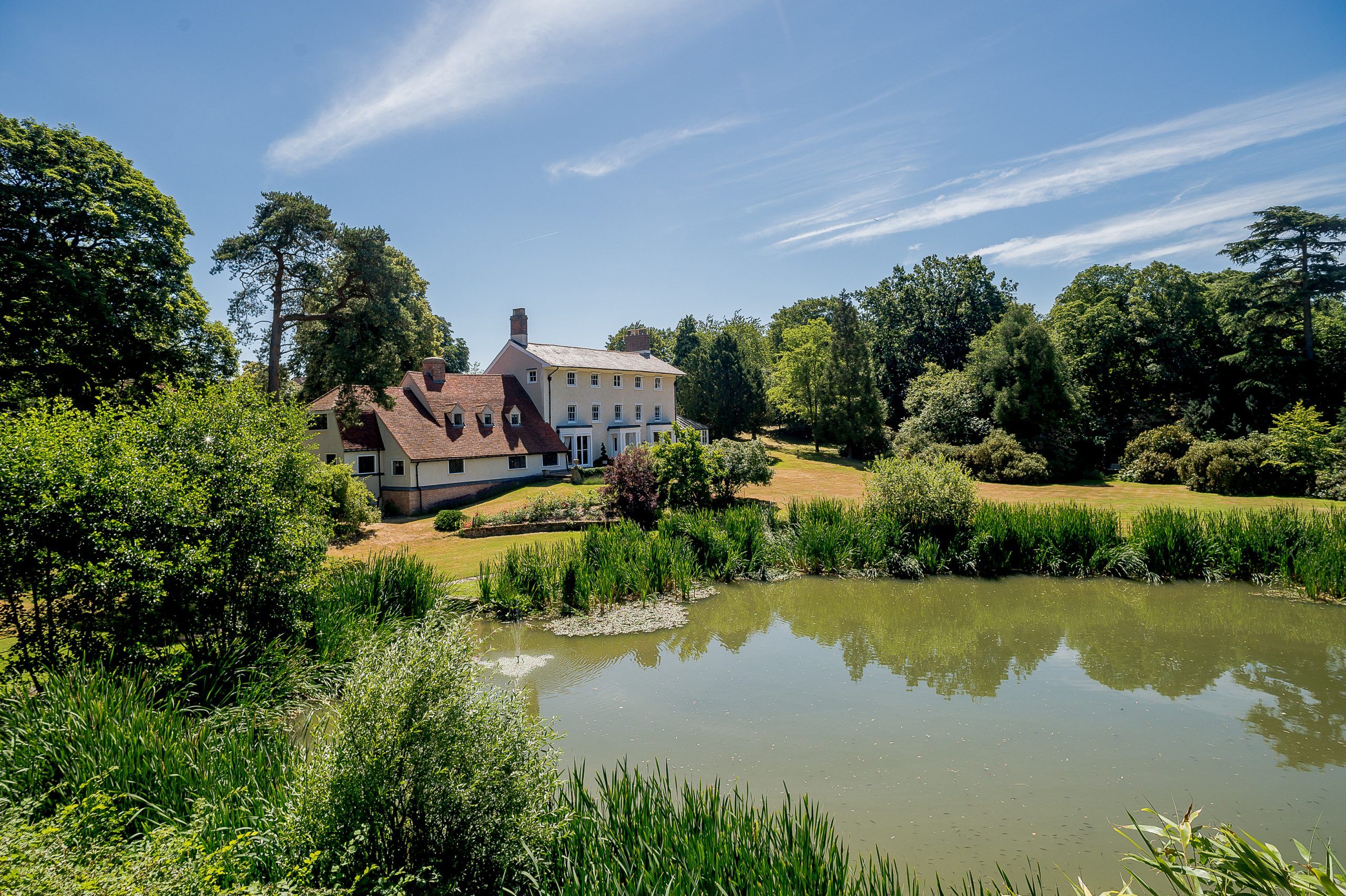 A fully-reinstated 18th century mansion, with an ornamental lake with ...