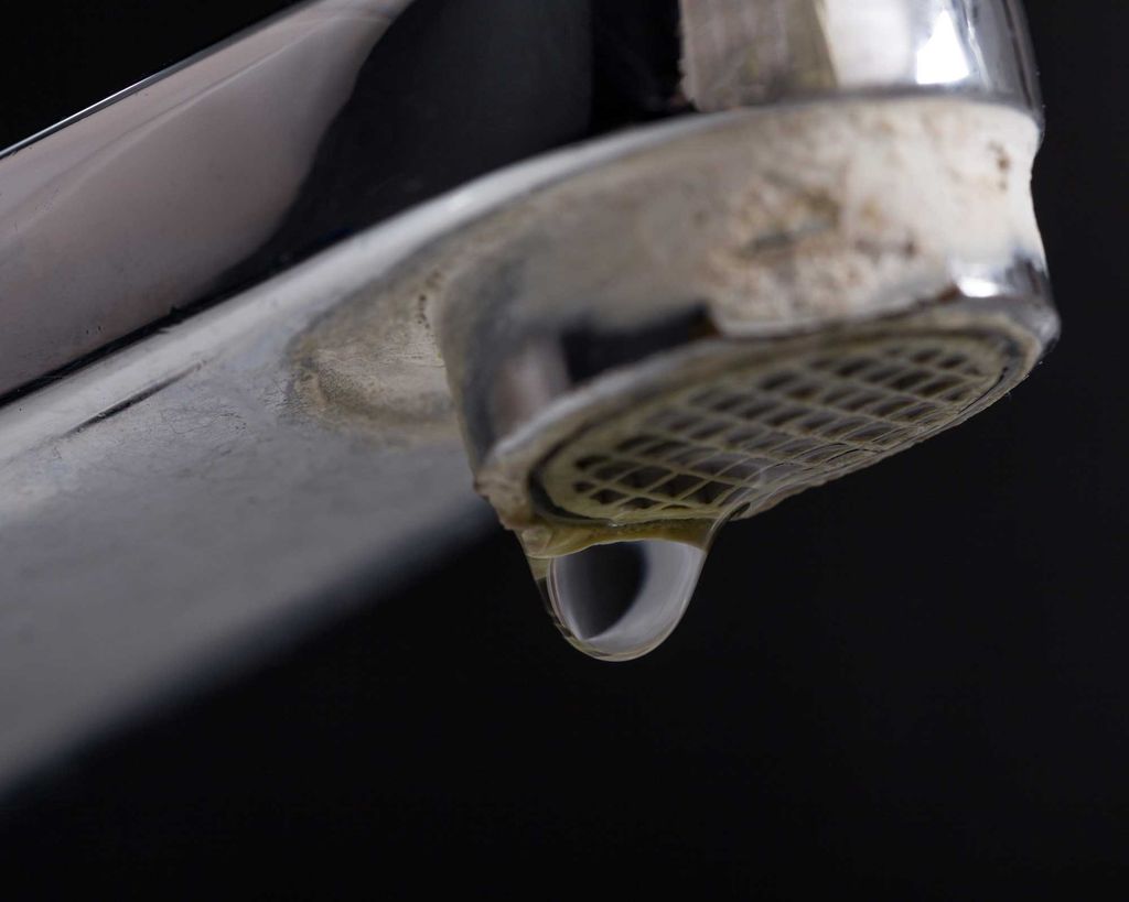Cleaning pros explain how to remove limescale from taps | Homes and Gardens