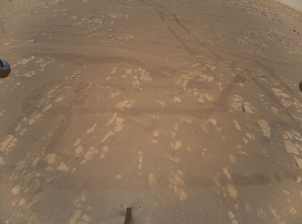 Mars helicopter Ingenuity snaps epic photo of rover tracks, will ...