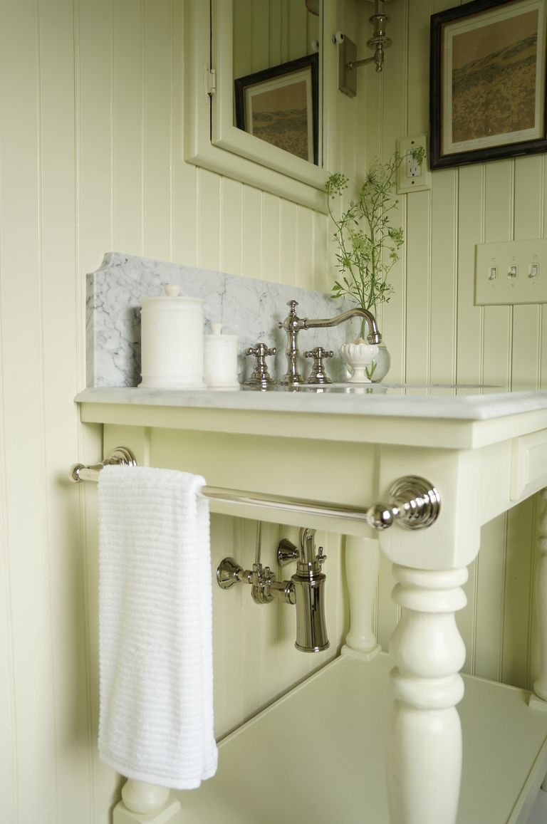 DIYer upcycles old kitchen table into marble-top bathroom vanity, on a ...