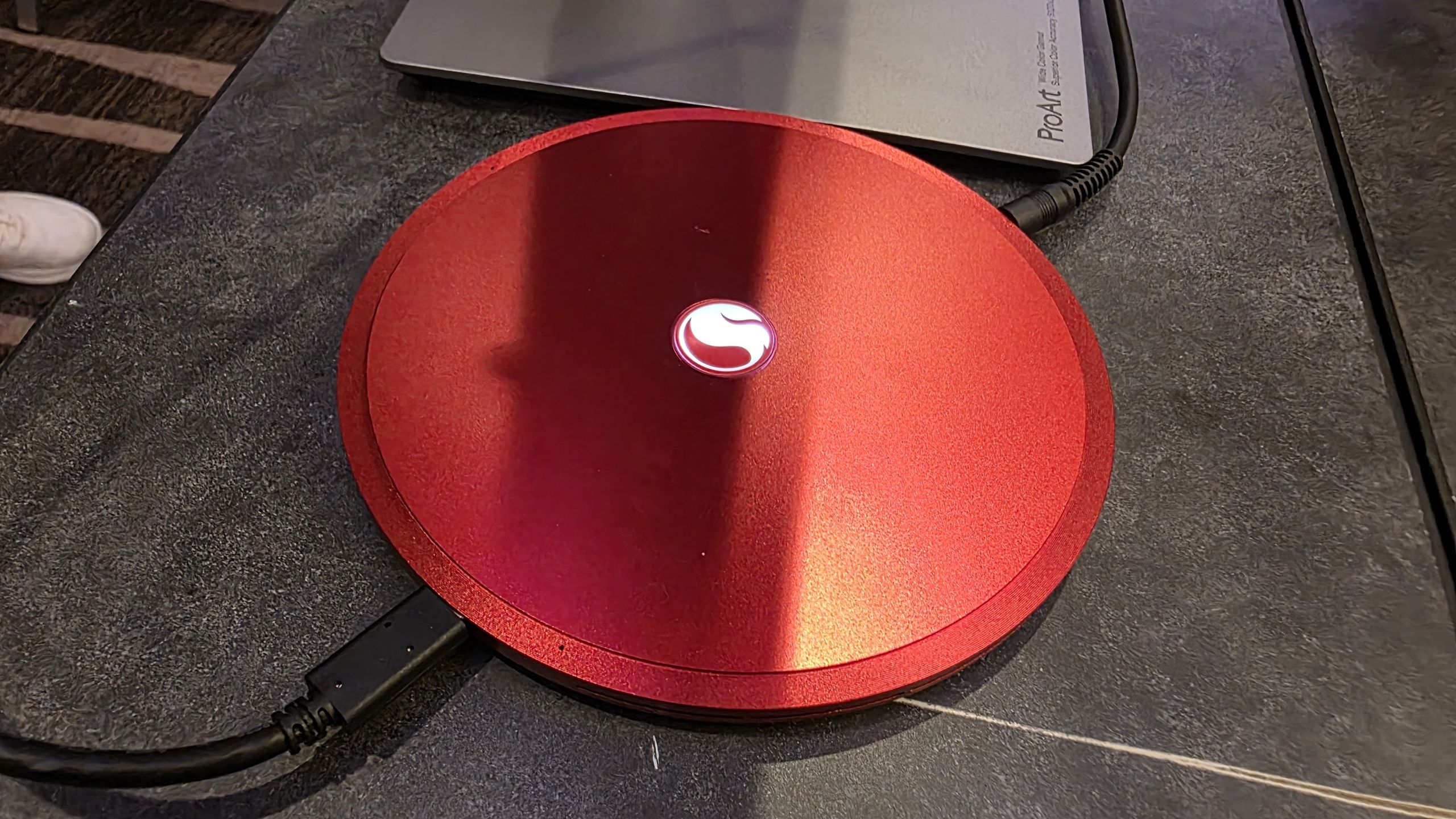 Qualcomm's Snapdragon X2 Elite reference mini PC looks like a coaster — some designs are cooled ...