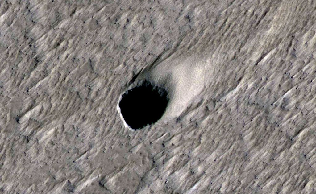 The 'hole' on Mars making headlines could be crucial to Red Planet ...