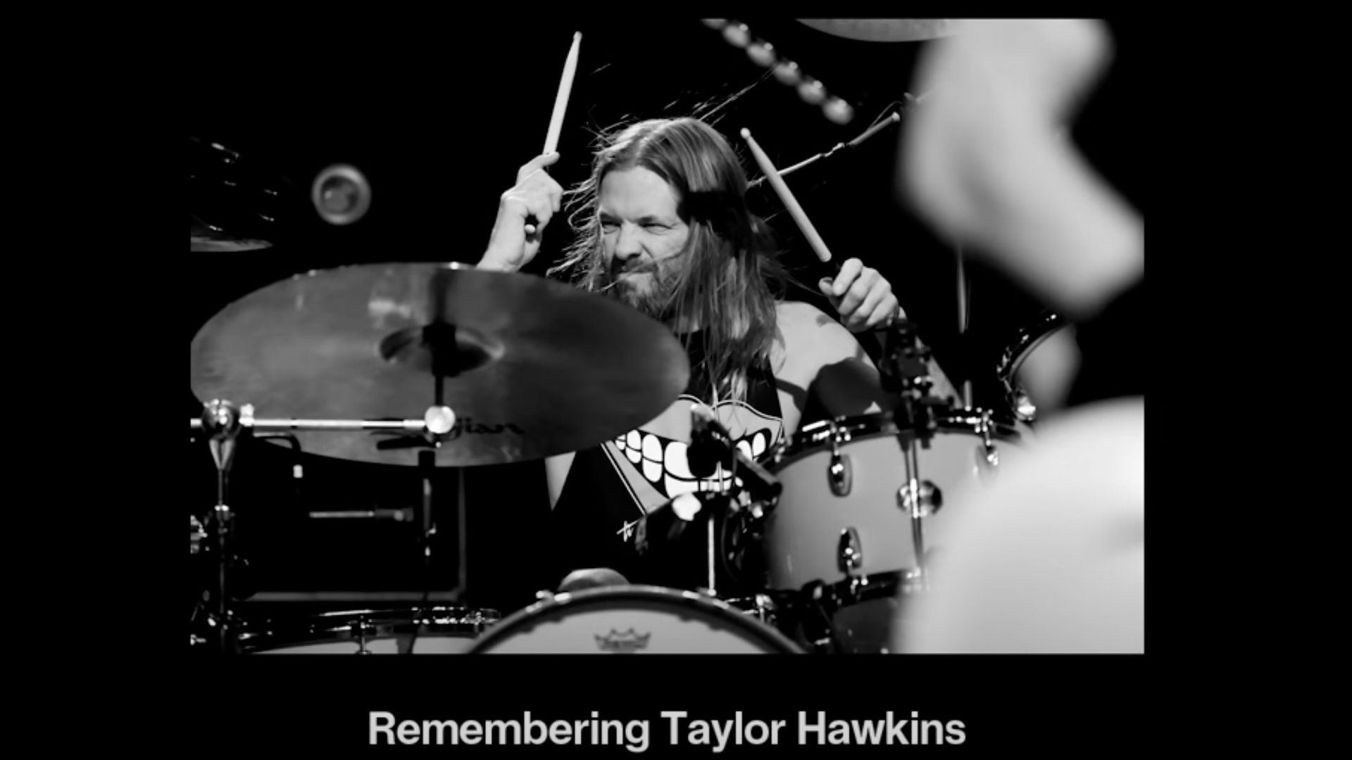 Watch 100 drummers mark the first anniversary of Taylor Hawkins' death ...