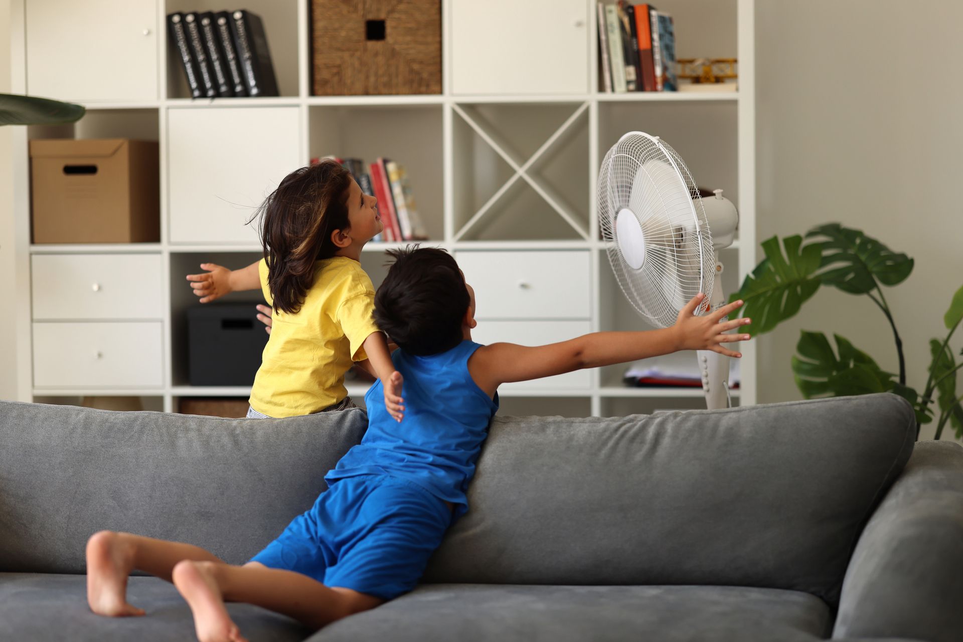 Fans vs Air Conditioners: Which Way Is Cheaper to Cool Off? | Kiplinger