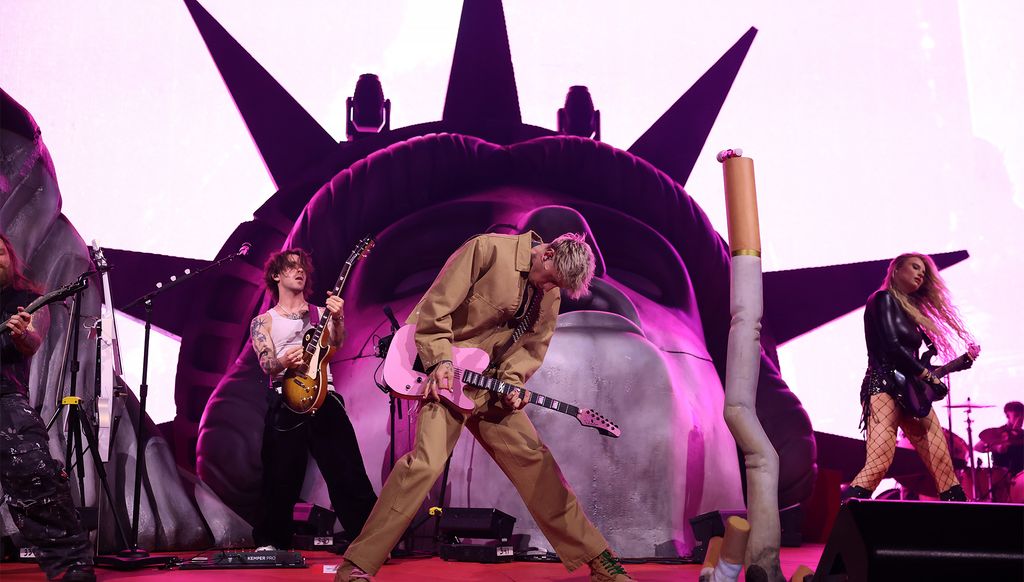 Machine Gun Kelly stops show after fan falls through stage | GuitarPlayer