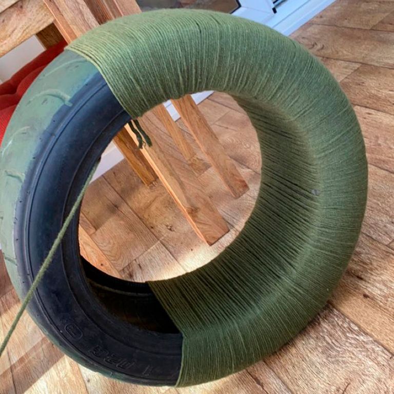 Homeowner makes unique garden furniture using old tyres and string ...