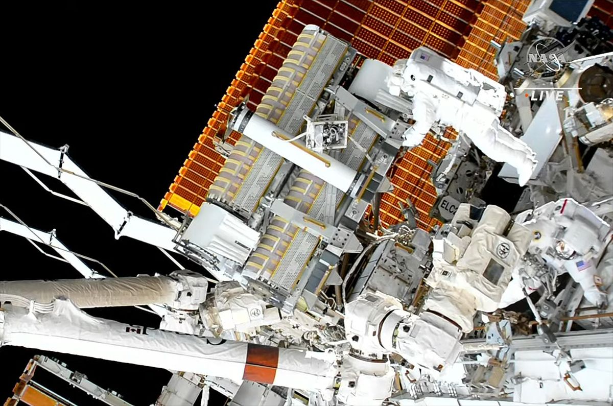 NASA astronauts on station spacewalk deploy roll-out solar array | Space