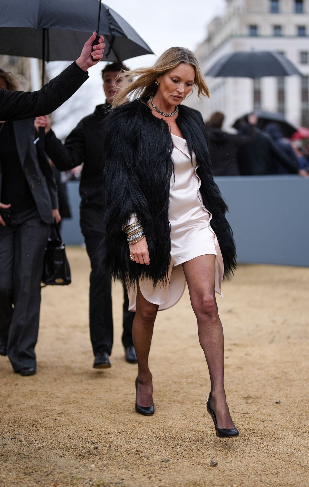 Kate Moss has been wearing this exact black fur coat for decades ...