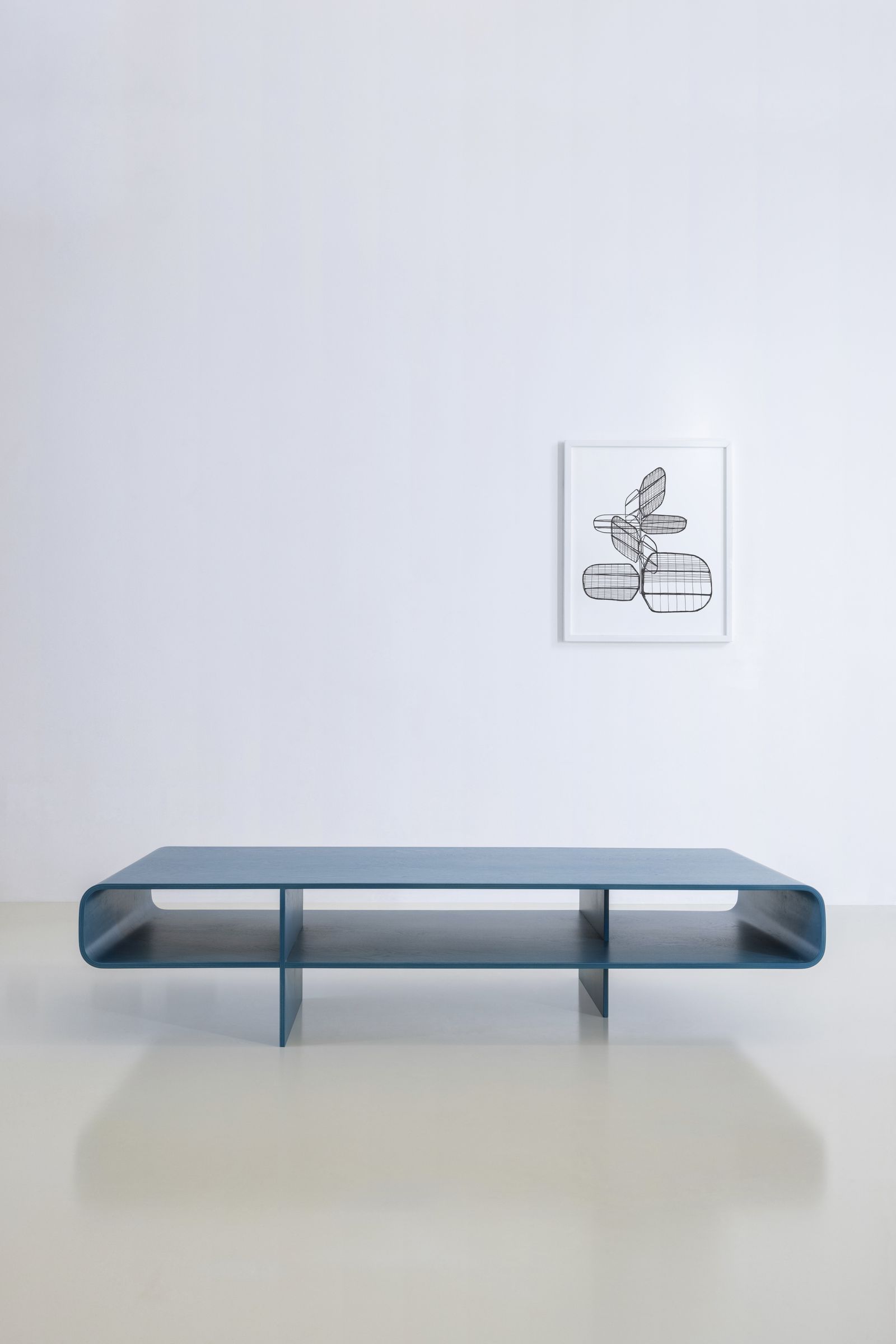 Barber Osgerby Loop table turns 25 and goes blue | Wallpaper*