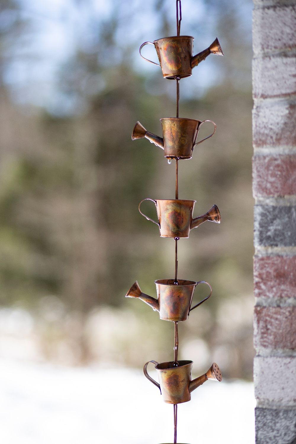 What are rain chains and how do they compare to downspouts? | Homebuilding