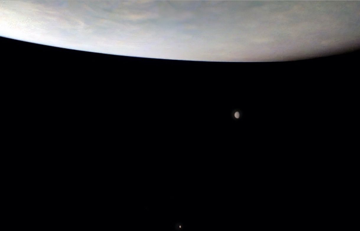 Juno probe snaps photo of Jupiter's atmosphere, 2 big moons | Space