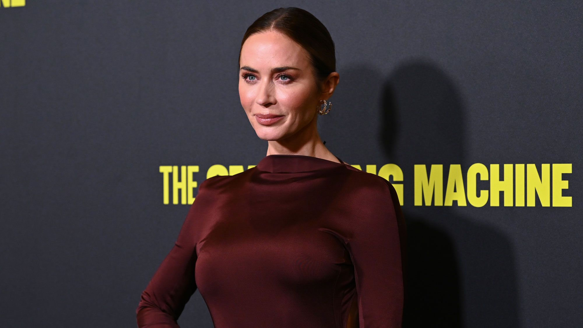 Emily Blunt's Red Tights Are Fall's Unexpected Style Staple | Who What Wear