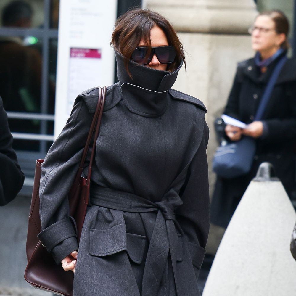 Victoria Beckham Styled a Funnel Neck Coat With Her Favourite Puddle ...