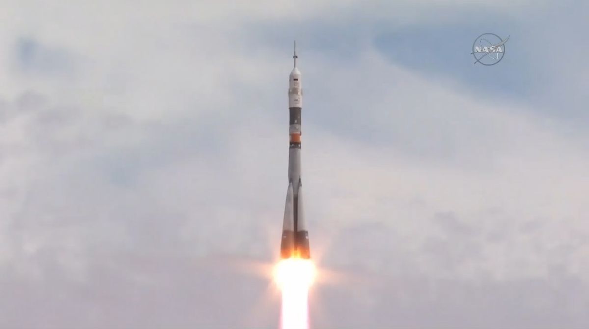 Russian Rocket Launches International Crew of 3 Toward Space Station ...