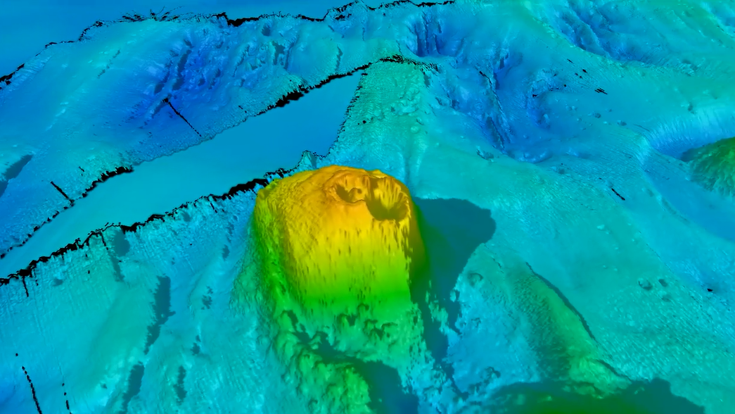 Zoom through a 'spectacular' chain of ancient underwater volcanoes on ...