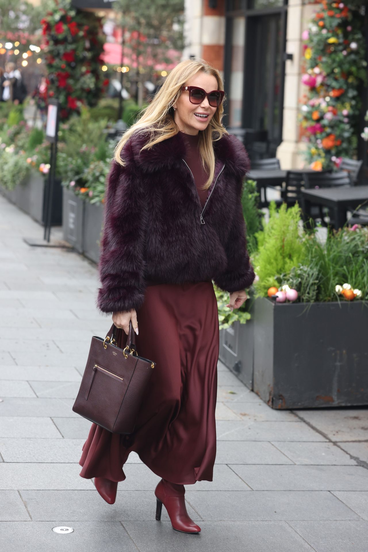 Amanda Holden is a vision in satin, faux fur and leather as she nails ...
