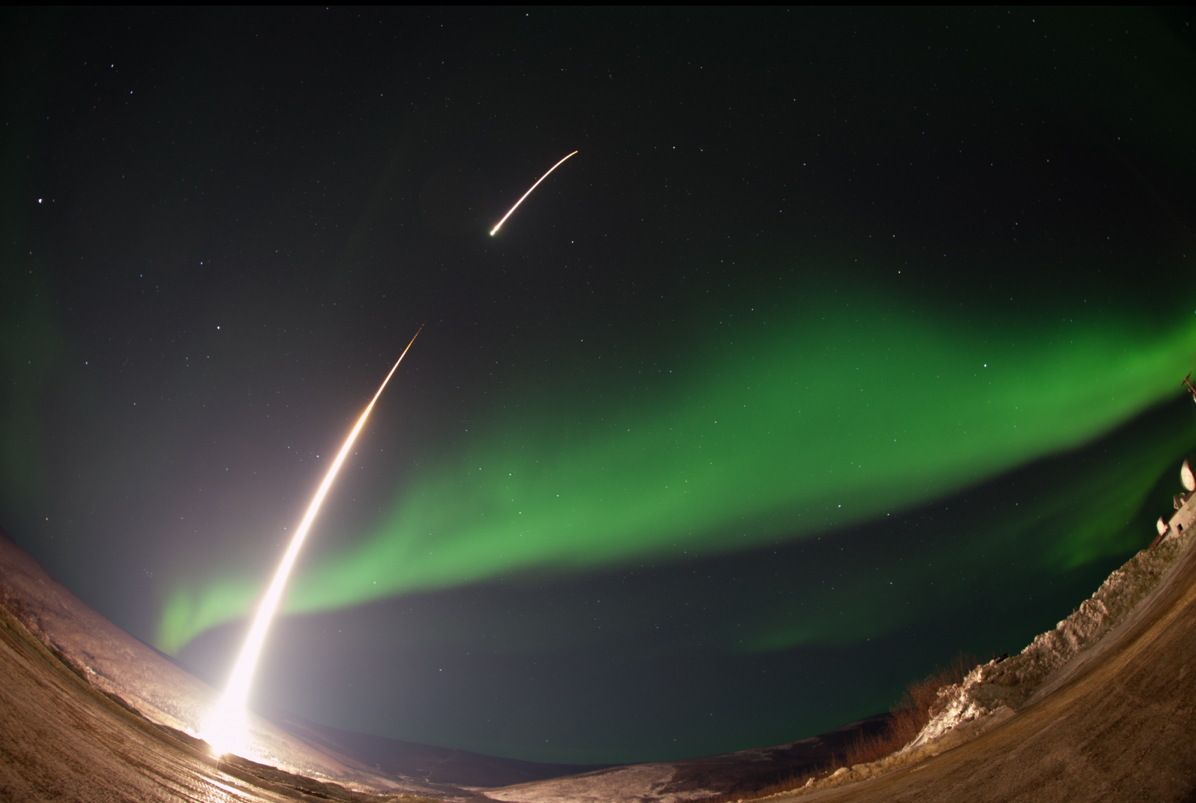NASA Rocket Streaks Through Aurora 'Curls' in Stunning Launch Photos ...