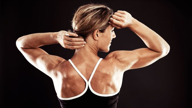 3 standing dumbbell exercises for building strong and defined shoulders ...