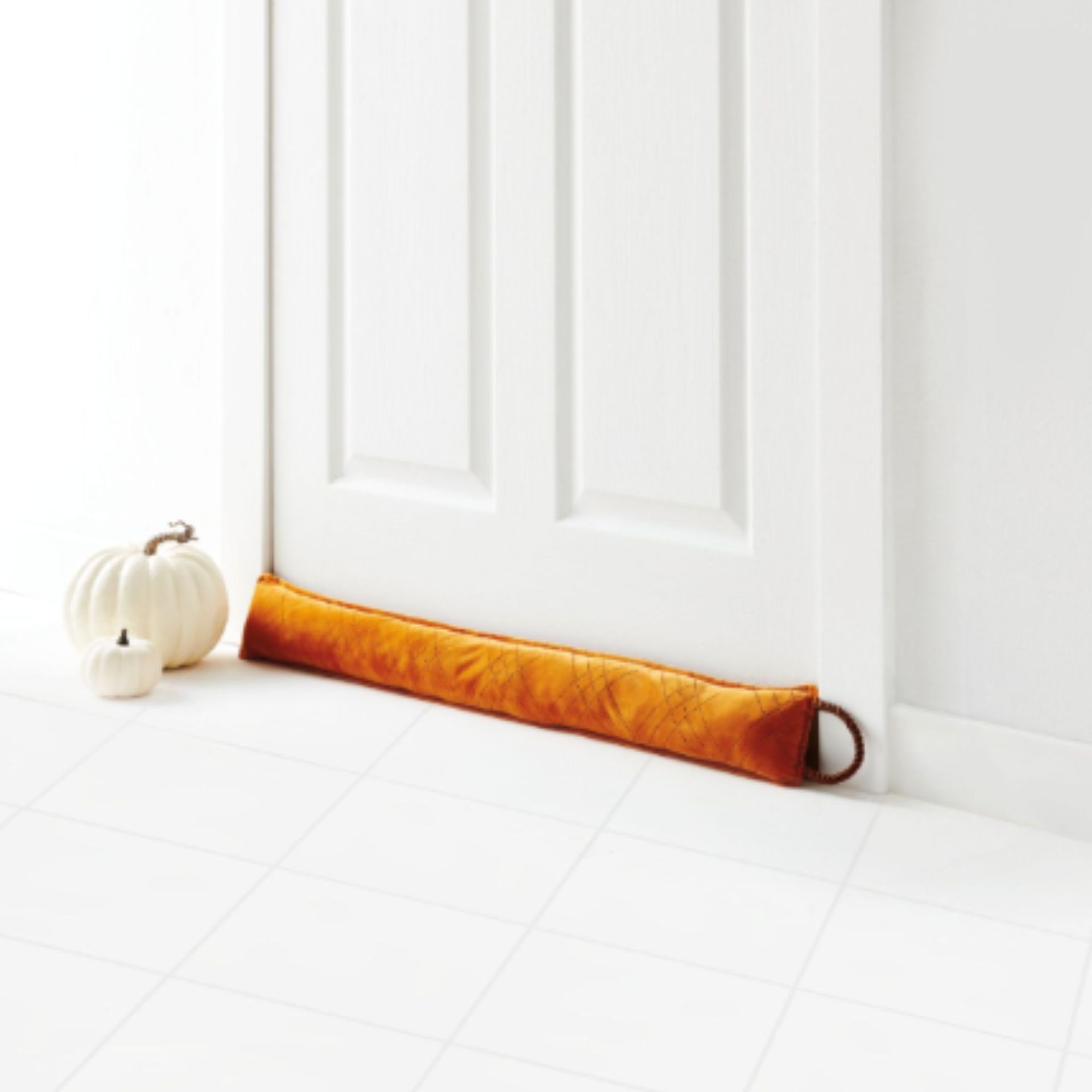 12 stylish door draft stoppers to keep things cozy at home | Real Homes