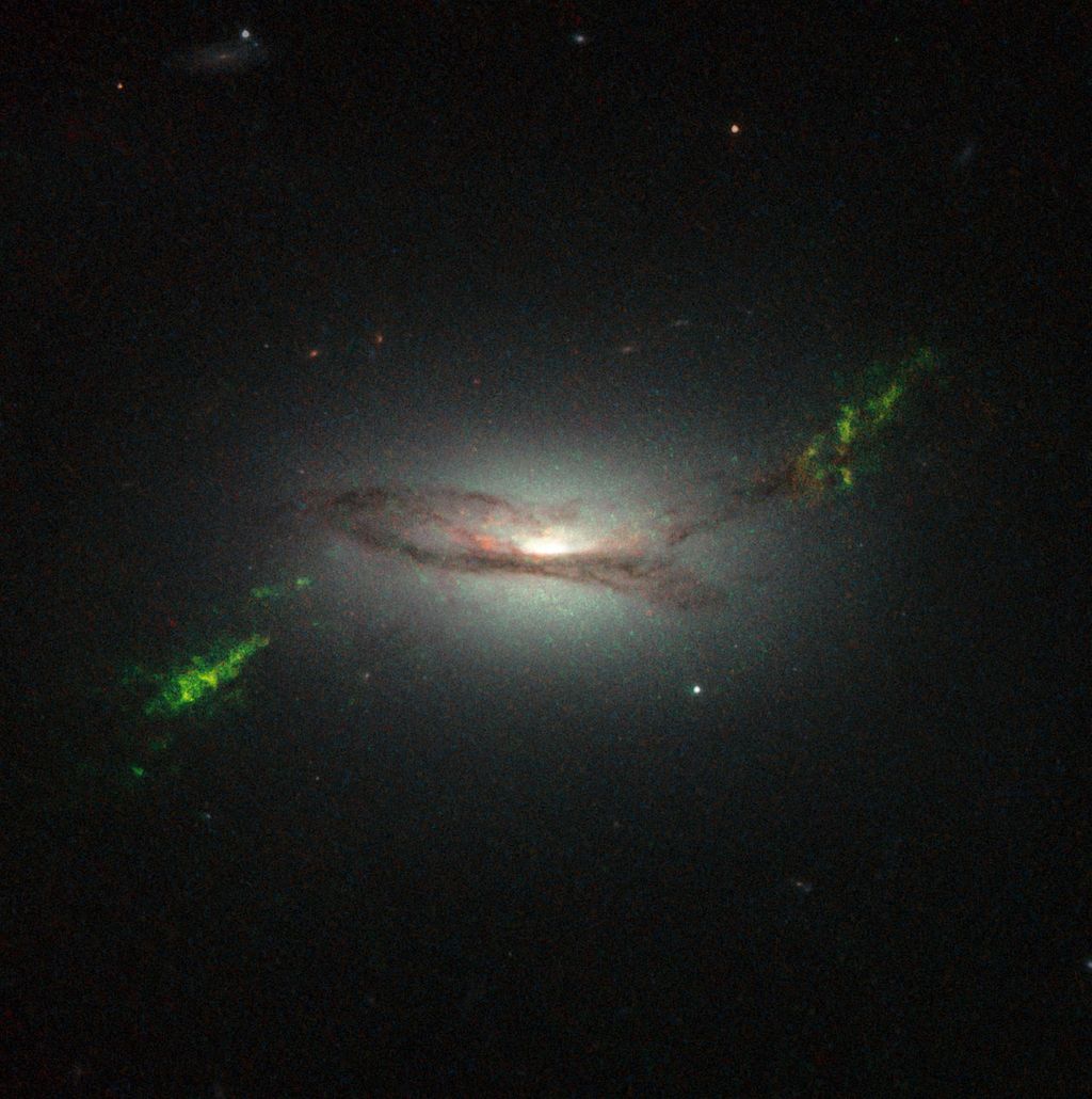 Eerie Green Space Clouds Glow in New Hubble Photos | Space