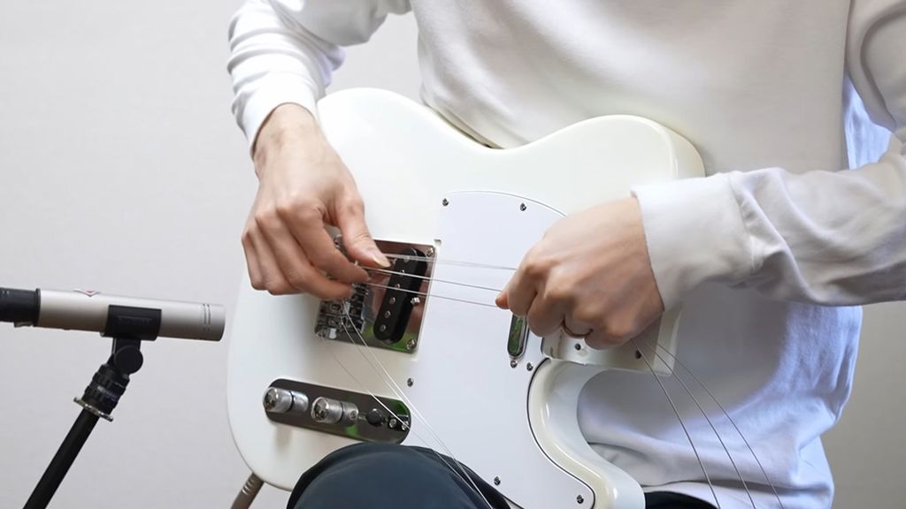 Seiji Igusa plays a guitar with no neck in his most bonkers video yet ...