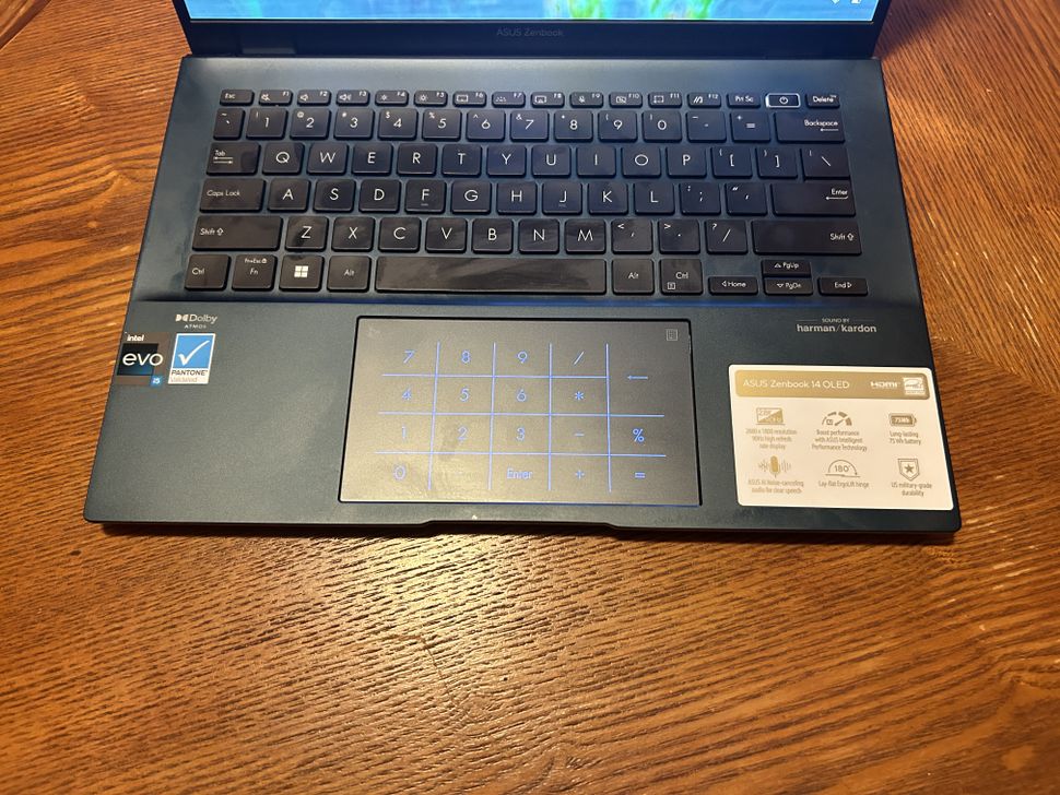 Asus Zenbook 14 (Q409ZA) OLED review — killer battery life for less ...