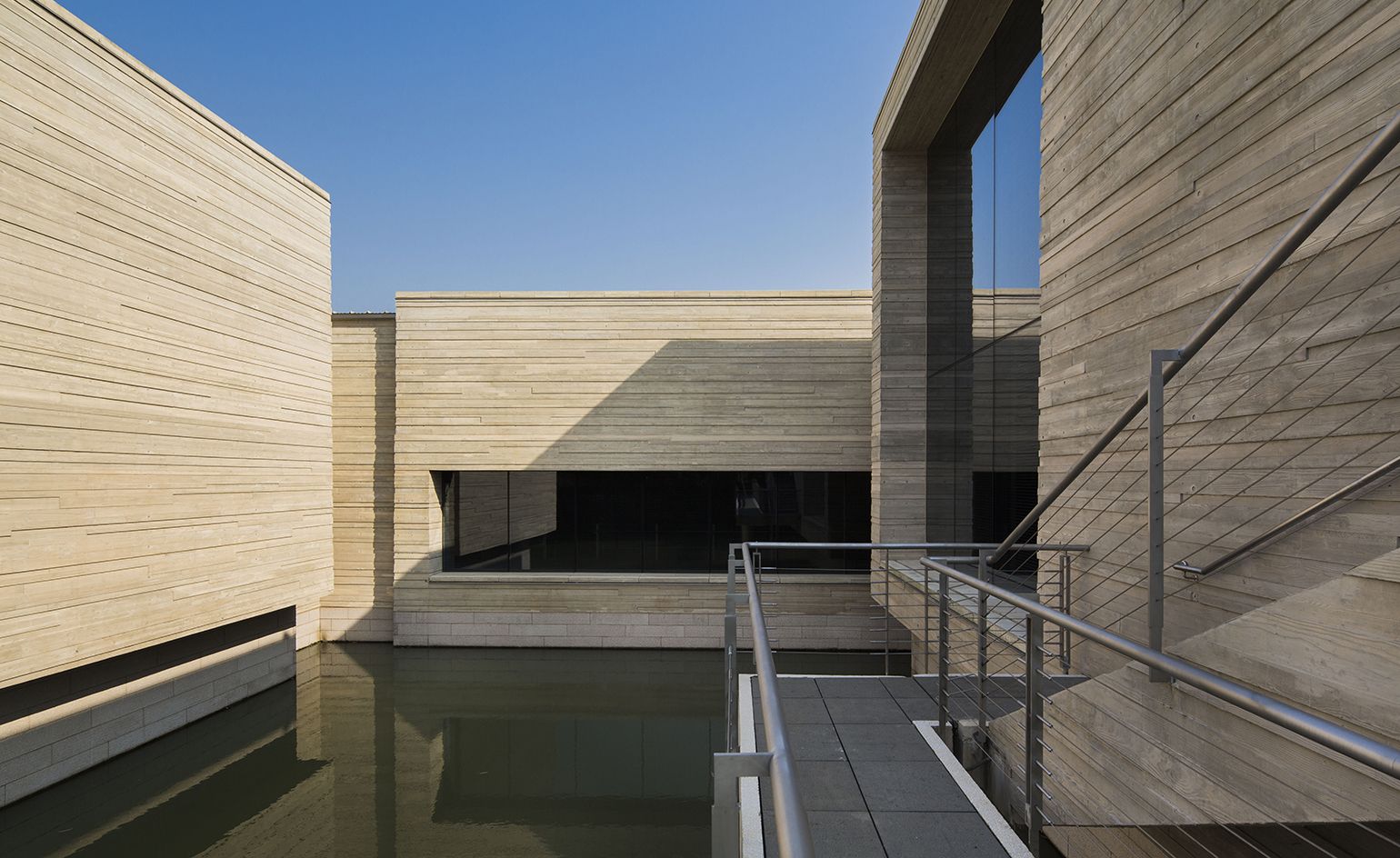 Low profile: the Muxin Art Museum is a delicate lakeside addition ...