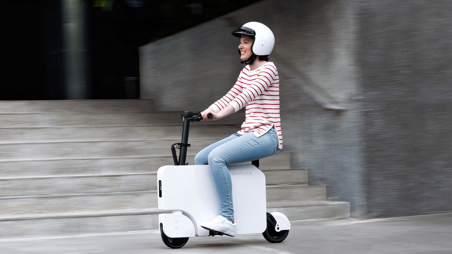 Honda's weird briefcase e-Scooter is back and it's packing serious 80s ...
