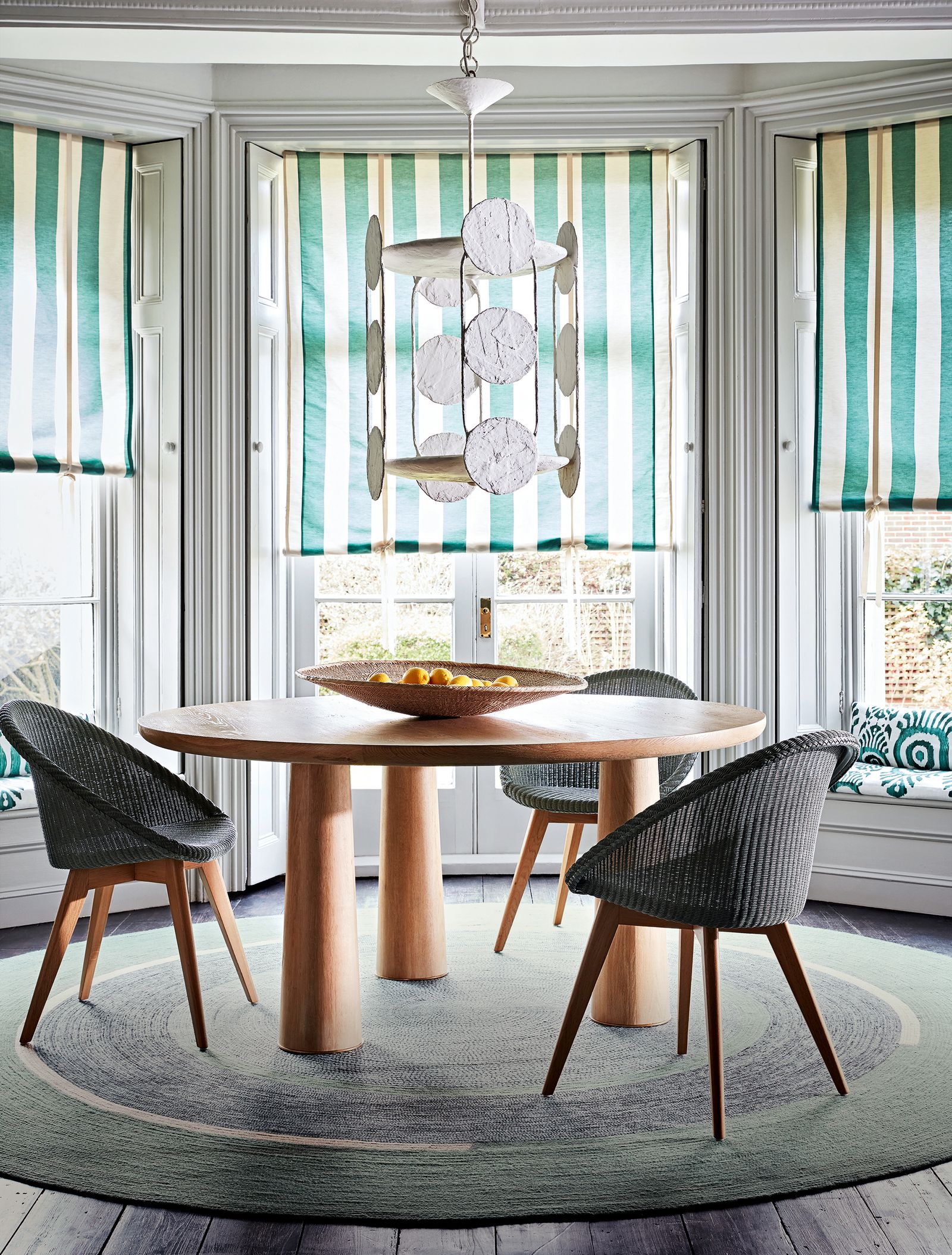 Should you put a rug under a dining table? Designers weigh in | Homes ...