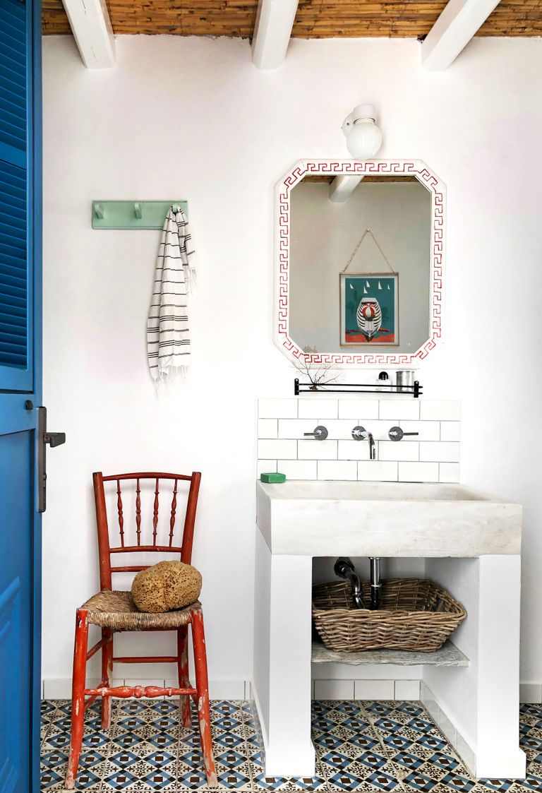 Explore a charming Greek villa that's had a colorful update to its ...