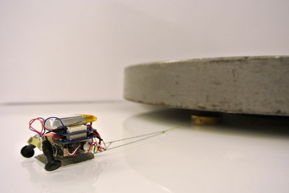 Watch 6 Teensy Robots Lift a 2-Ton Car | Live Science