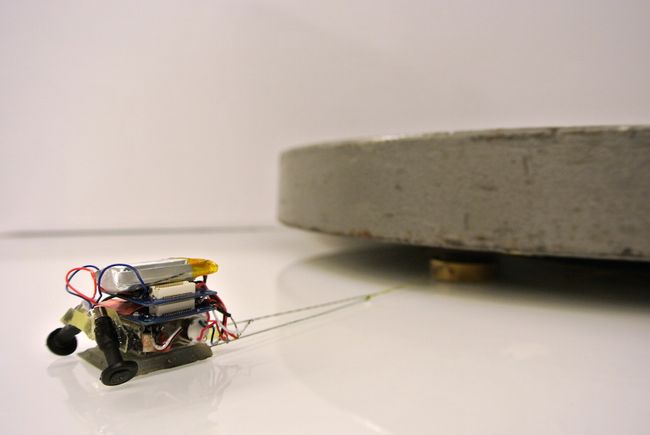 Watch 6 Teensy Robots Lift a 2-Ton Car | Live Science