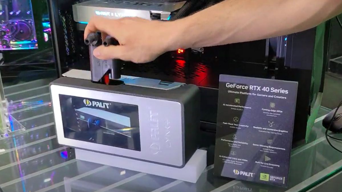 This overpowered RTX 4090 card has a built-in water block, a screen and ...