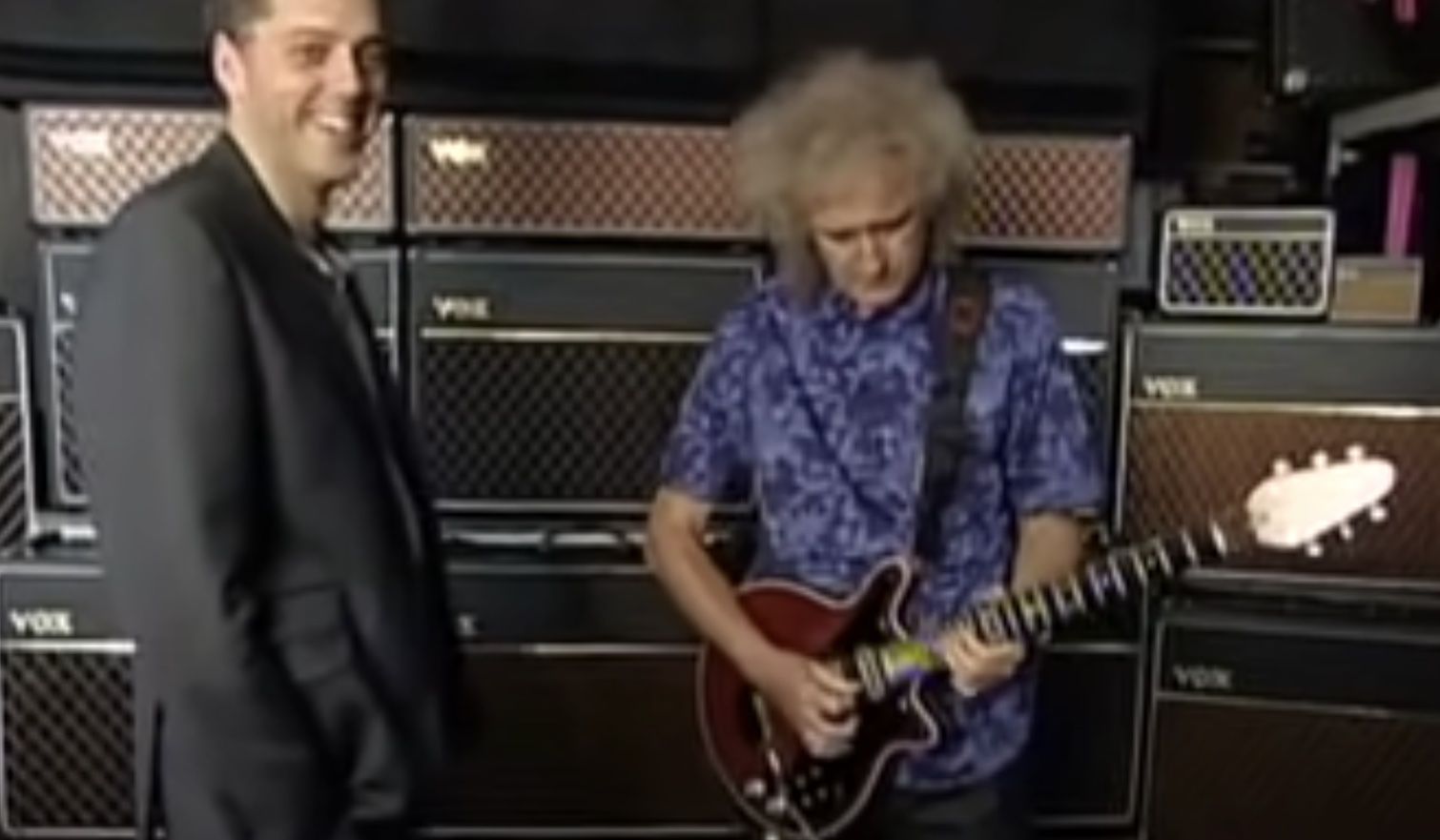 Watch Brian May make a TV presenter's day with an unaccompanied ...