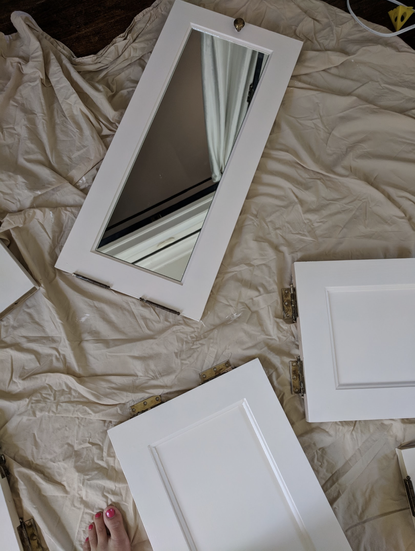 Transform basic cabinets with these DIY mirrored door insets | Real Homes