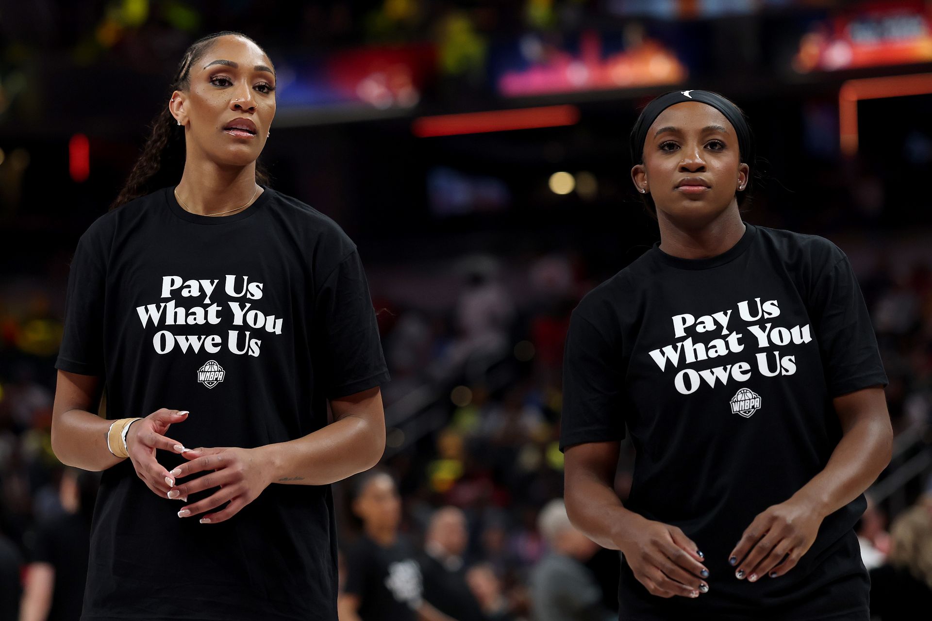 How “Pay Us What You Owe Us” Tees Became WNBA 2025 All-Star Weekend’s ...