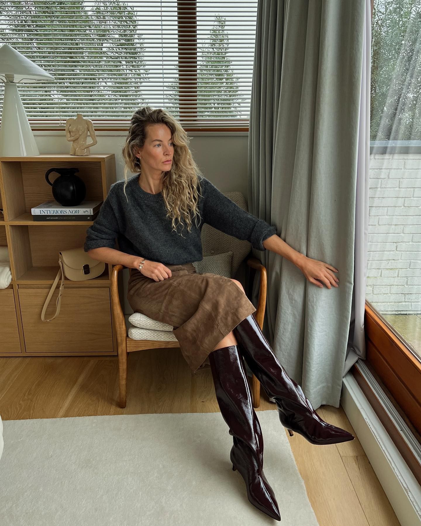 7 Skirt-and-Knee-High-Boots Outfits to Wear Again and Again This Winter ...