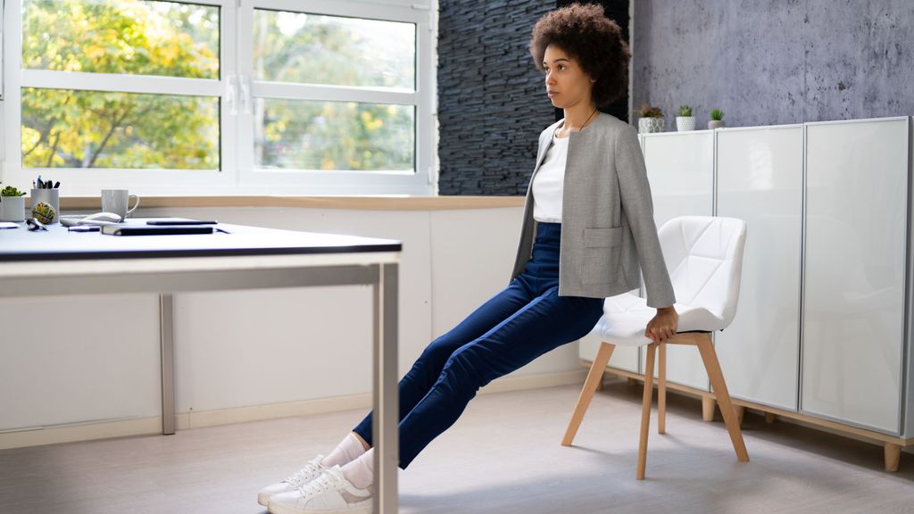 Boost circulation and mobility with this trainer's five-minute desk ...
