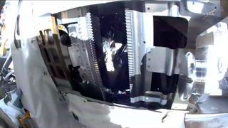 Astronauts complete prep for new ISS solar array on 1st NASA spacewalk ...