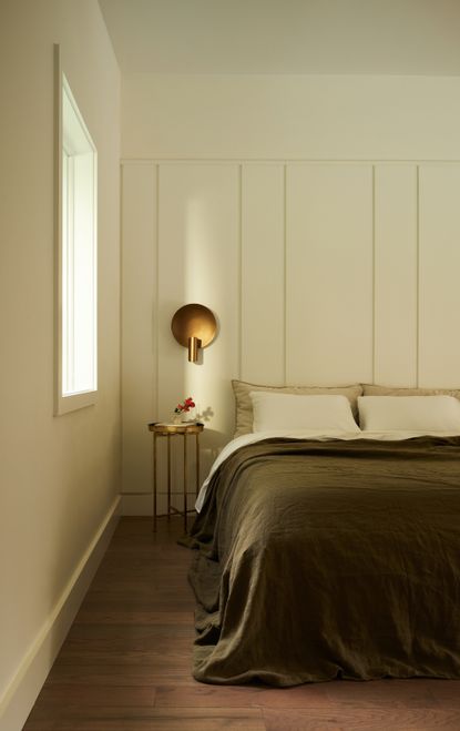 This minimalist house has a modern take on wall paneling we love