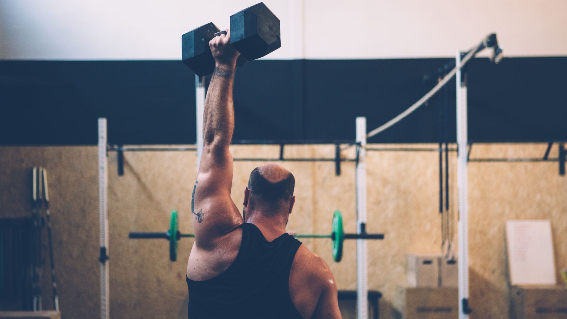 How To Do The Dumbbell Snatch | Coach
