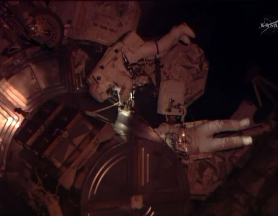 Spacewalking Astronauts Replace Dead Computer on Space Station | Space