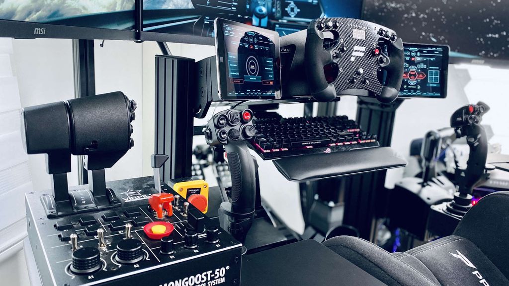 This gaming setup is the ultimate flight and racing sim battlestation ...