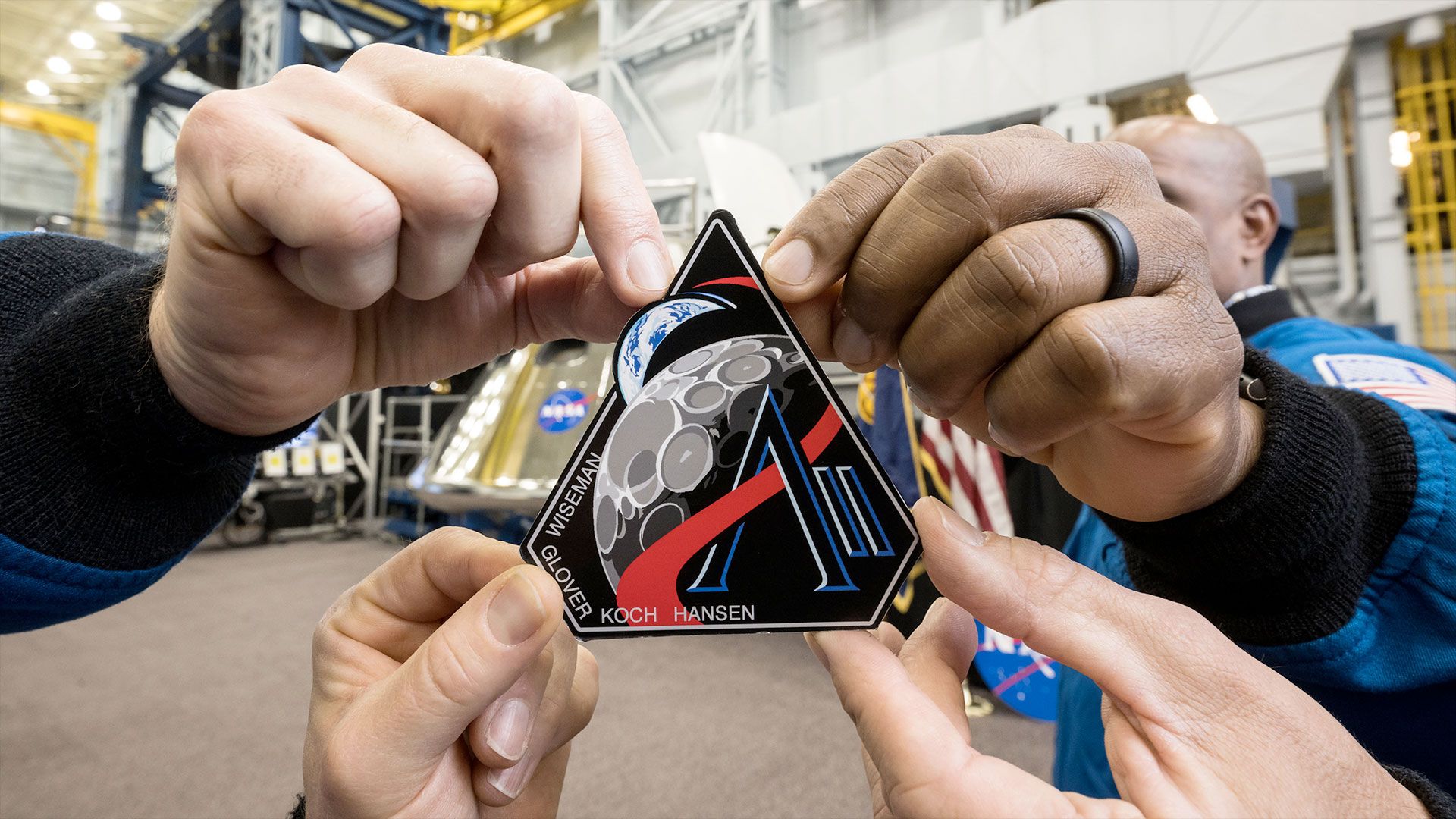 NASA's Artemis 2 astronauts reveal moon mission patch to honor 'AII ...