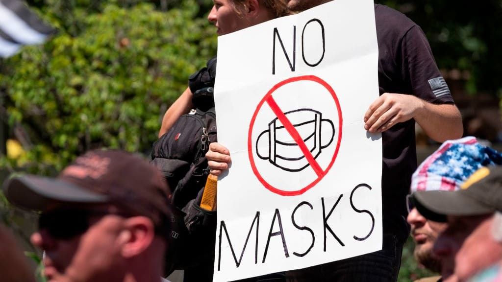 Anti-mask activist who organized protests in Texas dies of COVID-19 ...